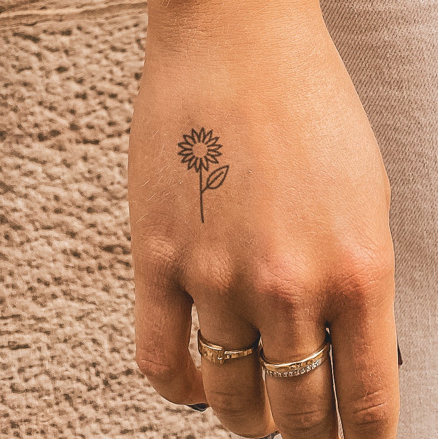 Simple Sunflower Tattoos Minimalist Sunflower Tattoo Ideas For 2025.