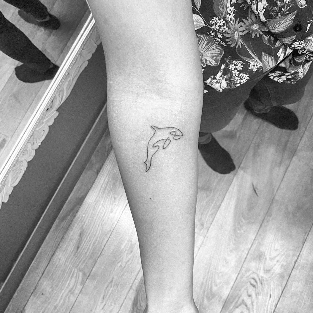 simple dolphin tattoo